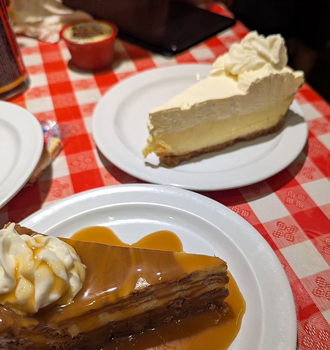 Dessert heaven comes in two forms here: velvety cheesecake up top and what appears to be a caramel-drizzled slice of decadence below—both demanding your undivided attention.