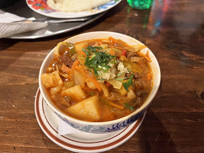 A hearty bowl of laghman soup that warms you from the inside out, with chunks of vegetables and meat playing hide-and-seek in the broth.