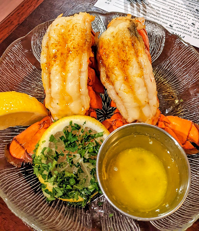 Florida lobster tails split and broiled to sweet perfection. The drawn butter isn't just a condiment&mdash;it's a commitment to indulgence.