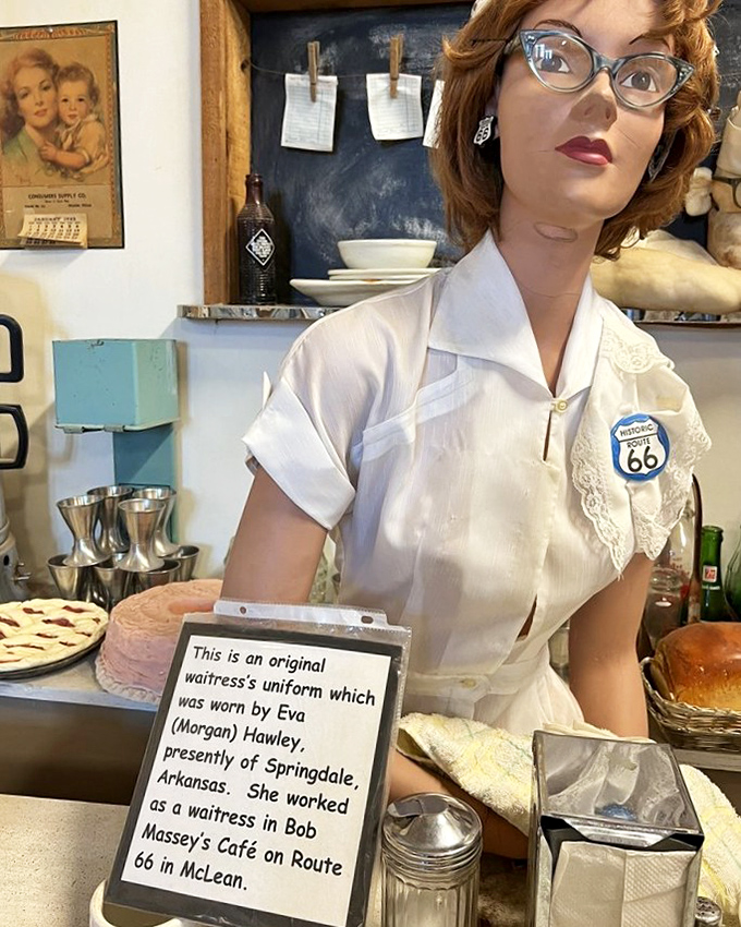 Meet your Route 66 waitress, forever poised to serve pie that never comes. Her uniform tells the story of roadside America's golden age.