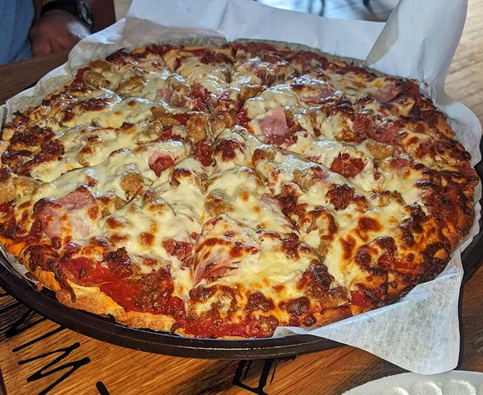 Pizza perfection doesn't need to be complicated. This pie's bubbling cheese and generous toppings demonstrate why classics become classics in the first place. 