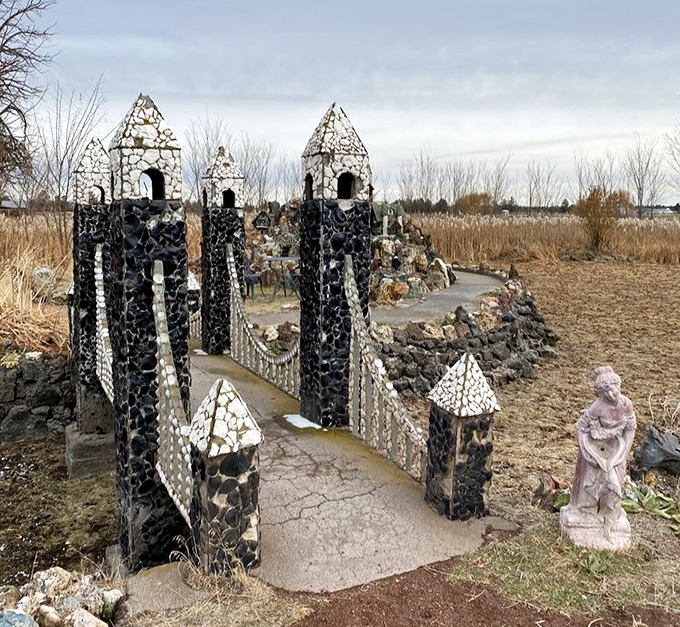 Medieval meets Americana in this striking stone gateway, where obsidian towers and white-tipped spires create a portal to another world.