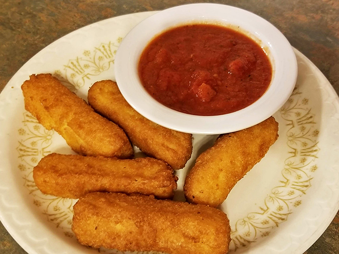 Golden mozzarella sticks with that perfect pull-apart cheese stretch &ndash; the kind that makes everyone at the table pause their conversation to watch.