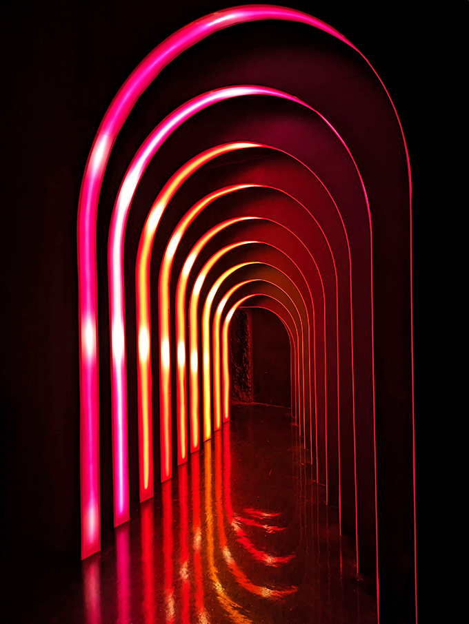 This rainbow-hued portal isn't just a hallway – it's a journey through the visible light spectrum itself.