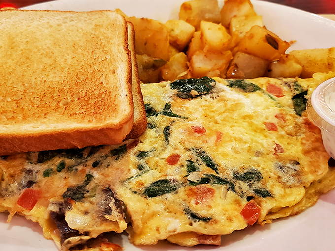 This isn't just an omelet; it's a morning masterpiece with vegetables folded into fluffy eggs that puts cereal to shame.
