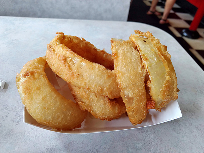 These onion rings aren't just fried&mdash;they're golden halos of crispy perfection that make angels weep with deep-fried joy.