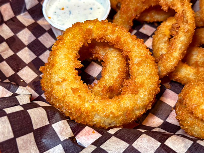Behold the golden glory! These aren't just onion rings; they're crispy halos of happiness that make you question why you'd ever waste calories on lesser versions.
