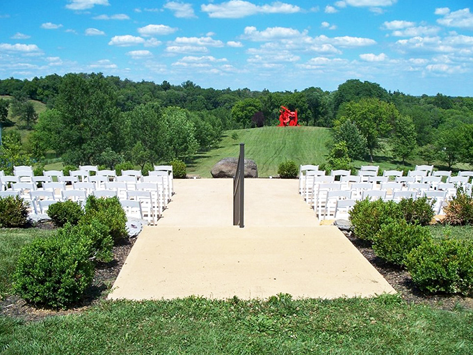 Wedding-ready or just a beautiful viewpoint? Either way, this setting offers a feast for the eyes with that red sculpture as the cherry on top.