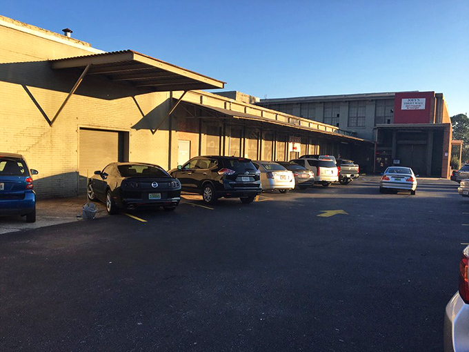 The parking lot fills with treasure hunters' vehicles, each representing someone's quest for that perfect find at rock-bottom prices.
