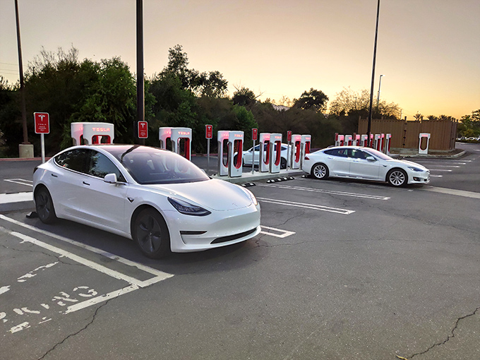 Tesla charging stations for the environmentally conscious bargain hunter. Save on designer clothes AND fossil fuels in one convenient location.