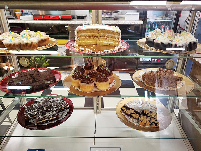 Sweet temptations behind glass – the universal language of dessert speaks clearly here, with each treat more photogenic than the last.