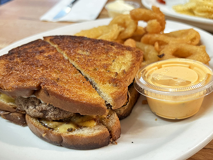 This patty melt whispers sweet nothings to your taste buds&mdash;crispy bread, melty cheese, and a burger patty that's lived a good, flavorful life. 