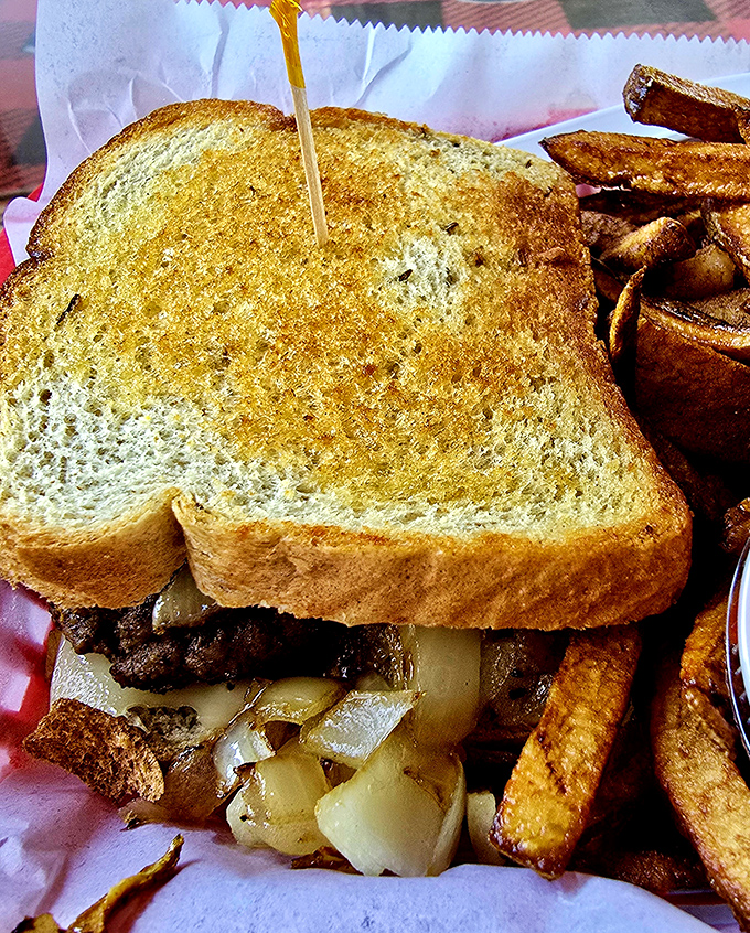 Grilled to golden perfection, the patty melt whispers sweet nothings to your taste buds with its symphony of beef, cheese, and onions.