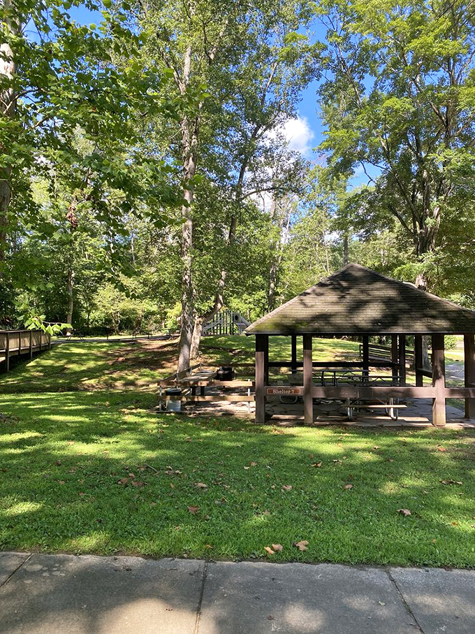This picnic shelter has witnessed more family memories than your photo album, standing ready for your turn to add a few more.
