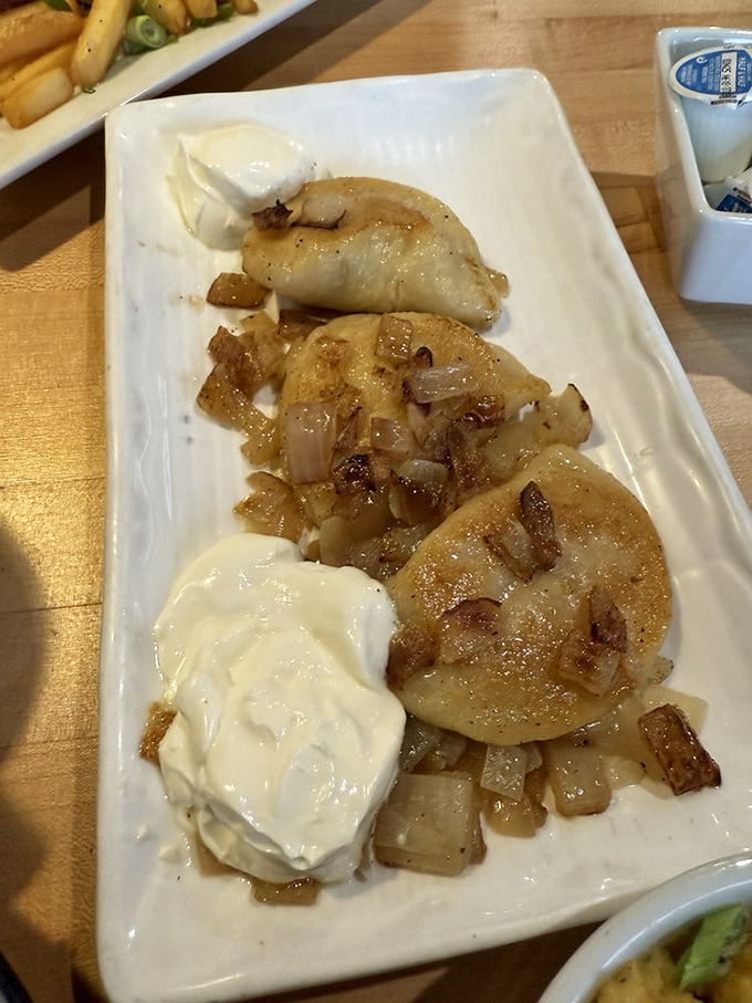 These pierogis aren't just food; they're little pockets of comfort wrapped in a culinary hug, with caramelized onions playing the perfect supporting role.