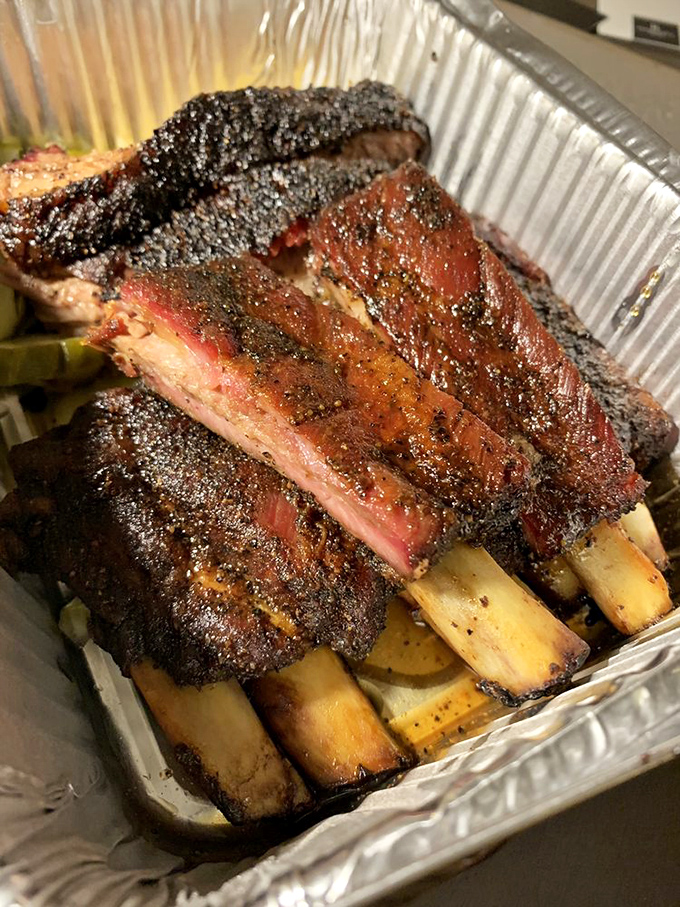 Ribs that would make Fred Flintstone weep with joy. The glistening fat and perfect char are like nature's most delicious jewelry.