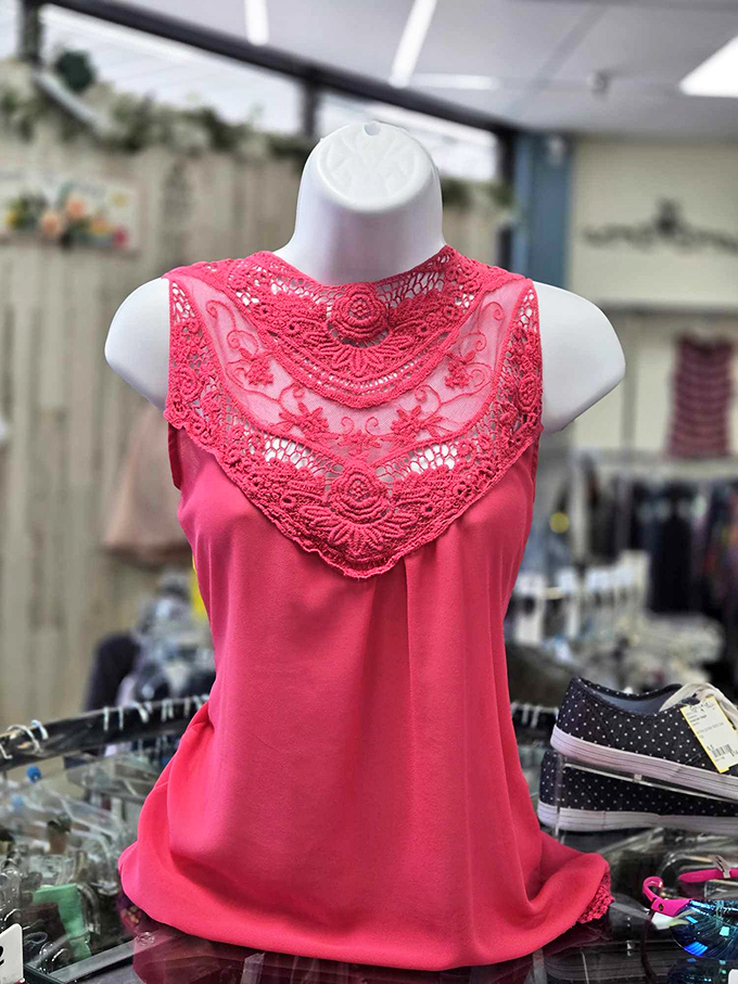 Lace details that whisper "I paid full price" while your wallet knows better. This coral top proves consignment shopping isn't about compromise.