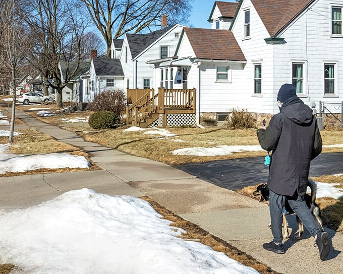 Winter in Wisconsin neighborhoods means that perfect balance of snow-dusted lawns and cleared sidewalks&mdash;a testament to Midwestern efficiency and neighborly consideration.