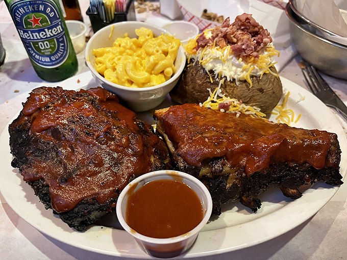 Ribs slathered in sauce that requires at least three napkins, a loaded baked potato, and mac and cheese that's worth every calorie. Diet starts tomorrow.