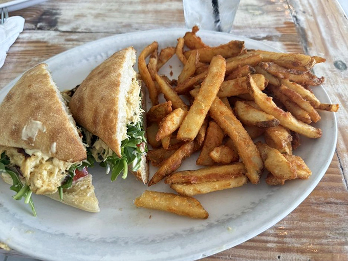 The sandwich that launched a thousand lunch cravings. Those golden fries aren't just a side dish &ndash; they're the supporting actors who steal the show.