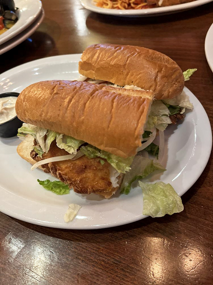Not all heroes wear capes; some come on fresh bread with crispy chicken, lettuce, and a side of ranch that whispers, "Diet? What diet?"