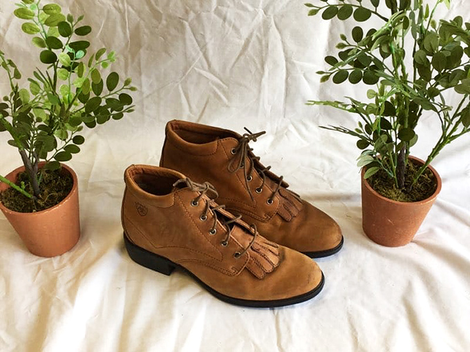 These leather ankle boots flanked by potted plants aren't just footwear&mdash;they're the beginning of your "I can't believe these were secondhand" fashion story.