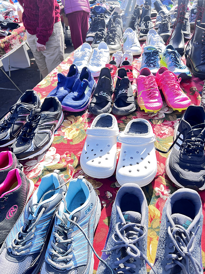 Footwear fantasyland where Crocs peacefully coexist with Adidas, proving that at the flea market, fashion rules are delightfully suspended.