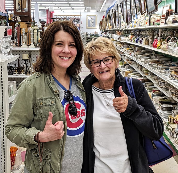 The image shows happy shoppers enjoying their thrifting adventure, with smiles that tell the universal truth: finding a great deal creates joy that transcends generations.