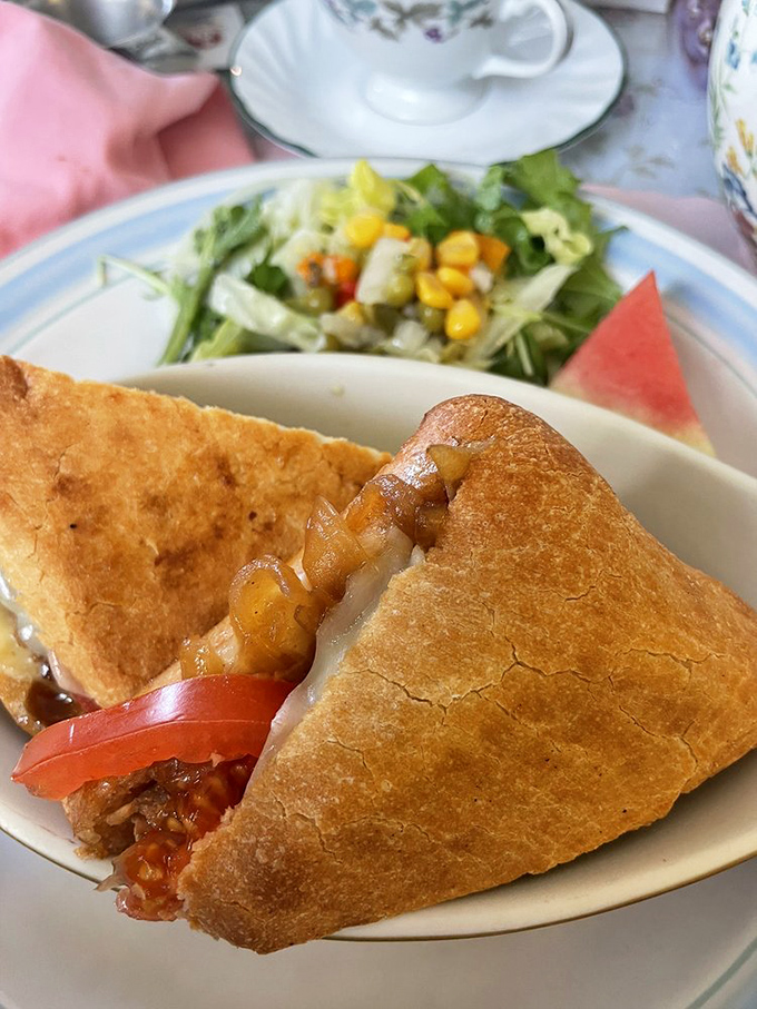 That panini is having an identity crisis on fine china, and honestly, it's working beautifully.