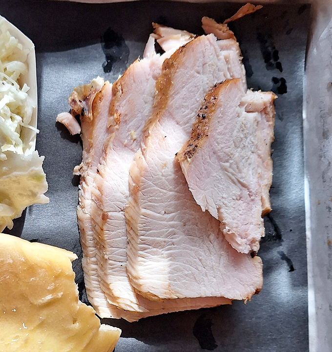 Turkey breast that defies the "dry poultry" curse. Whoever smoked this bird deserves a parade down Main Street.