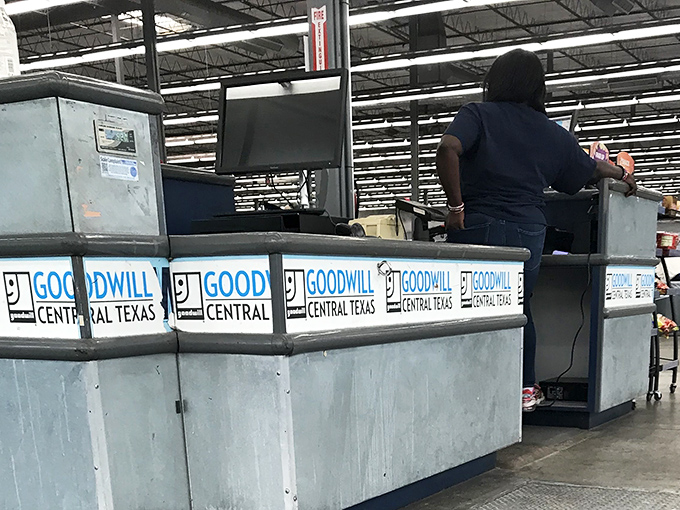 The unsung heroes of the outlet keep fresh merchandise flowing throughout the day. New bins mean new opportunities for eagle-eyed shoppers.