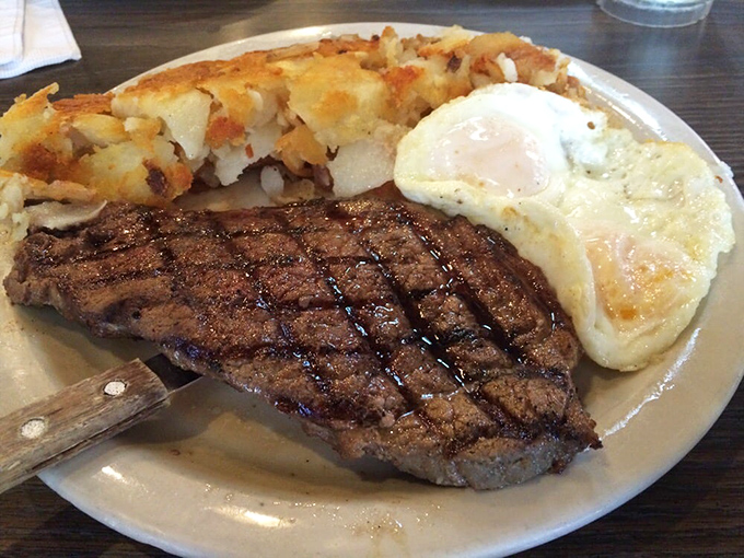 This isn't just steak and eggs; it's morning protein perfection. The grill marks tell stories of flame-kissed excellence that no trendy brunch spot can match.