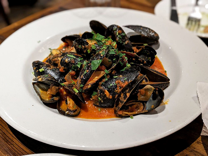 These mussels aren't just steamed&mdash;they're transformed into vessels of flavor, swimming in a sauce worthy of bread-dipping acrobatics.