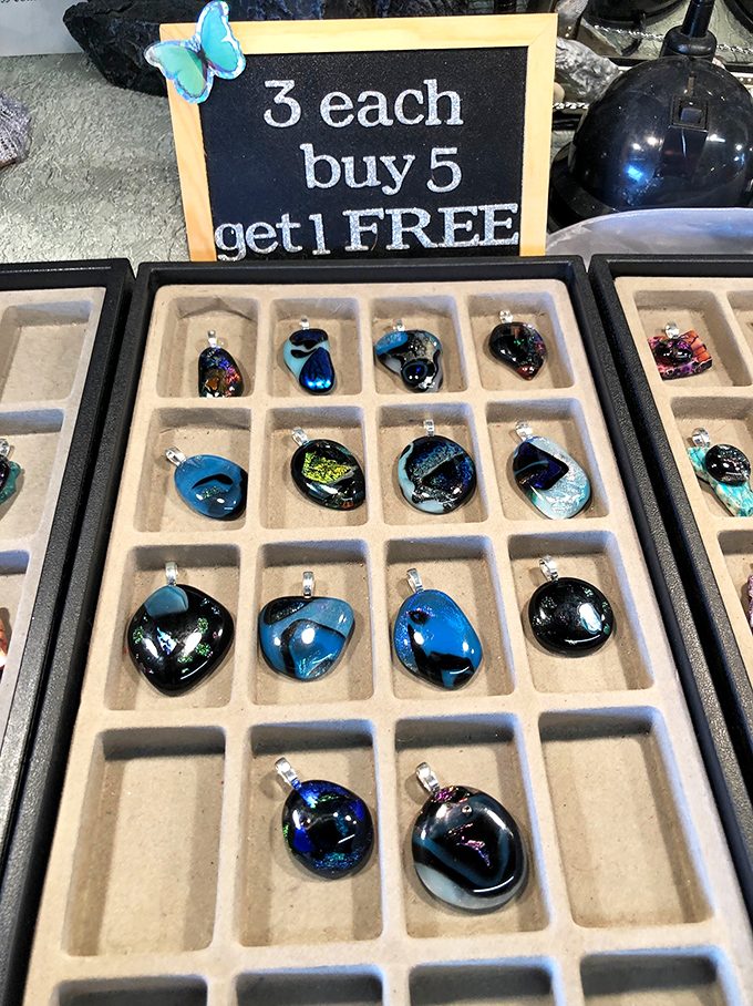 These glass pendants catch light like tiny aquariums for your neck. Buy five, get one free—math that makes sense even to the arithmetically challenged!
