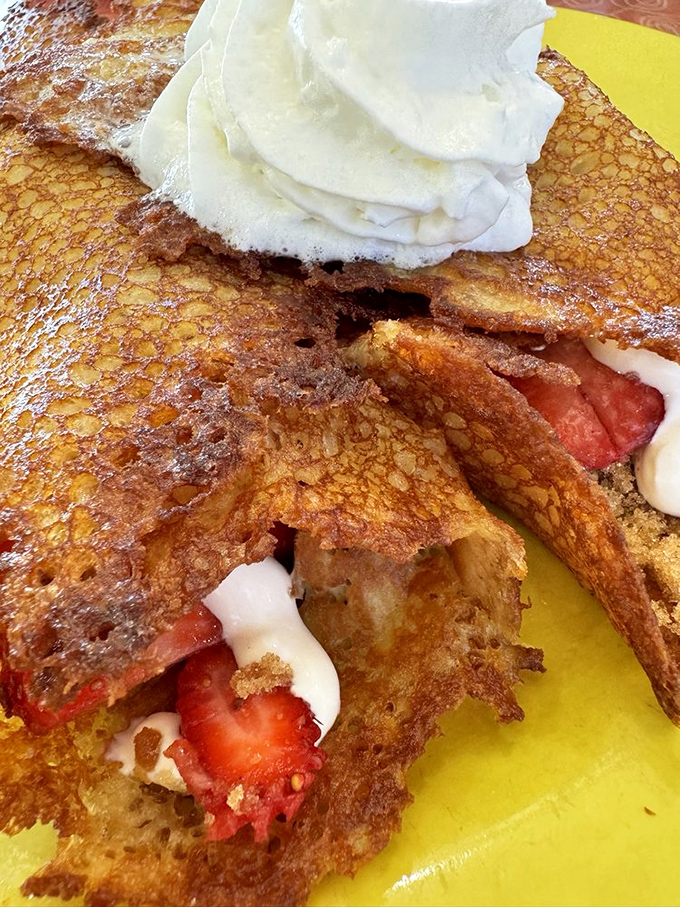 Thin, crispy edges giving way to sweet strawberry filling&mdash;these aren't just hotcakes, they're edible love letters to your taste buds.