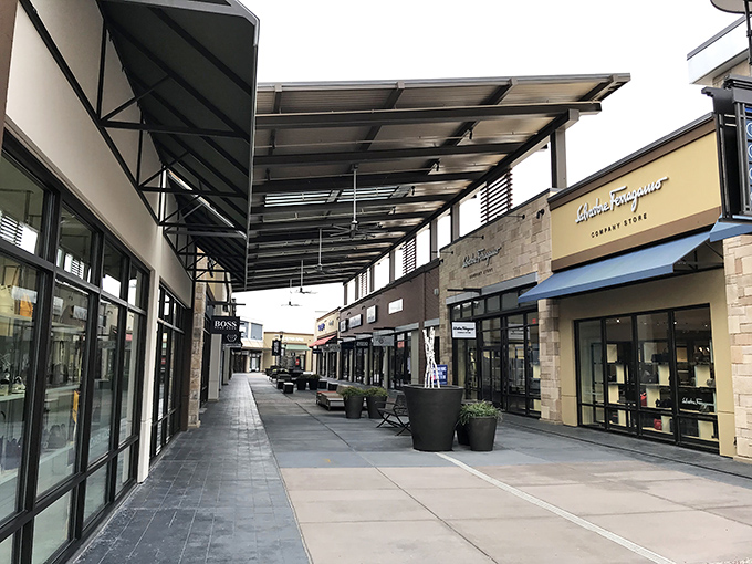 The covered walkways offer protection from Maryland's unpredictable weather, ensuring nothing comes between you and that half-price cashmere sweater.