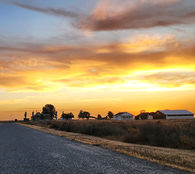 Magic hour transforms Allensworth into a golden tableau, the buildings silhouetted against a Central Valley sunset that would make any cinematographer weep.