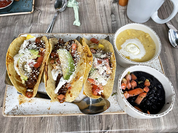 Breakfast tacos: where morning ingredients find their true calling wrapped in warm tortillas. The side of black beans isn't optional, it's essential.