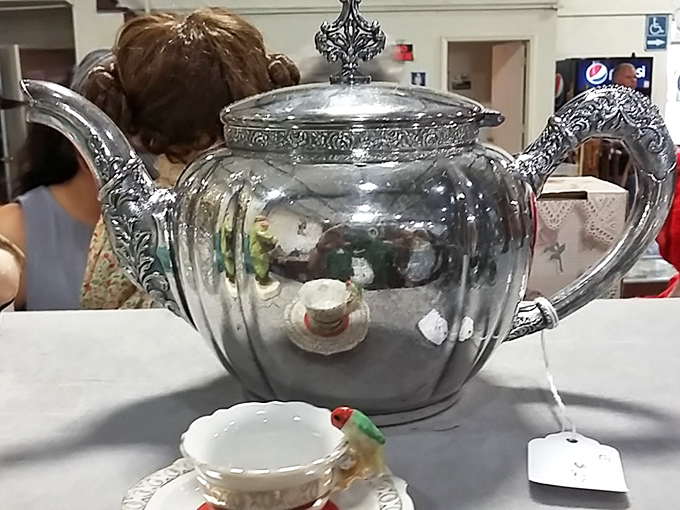 This silver teapot has likely poured for generations of Virginians, its ornate details whispering of more elegant times when tea wasn't just grabbed to go.