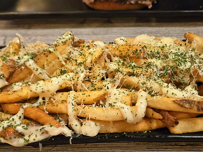 These aren't just fries &ndash; they're potato masterpieces, elevated with herbs, cheese, and a drizzle that makes ketchup seem obsolete.