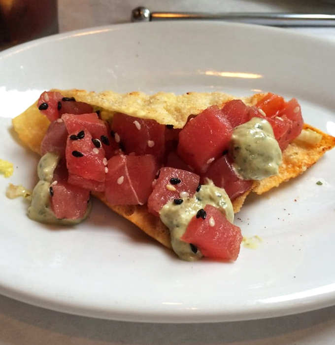 Fresh tuna tacos that make you question why you ever settled for ground beef. That avocado-sesame sauce deserves its own fan club.