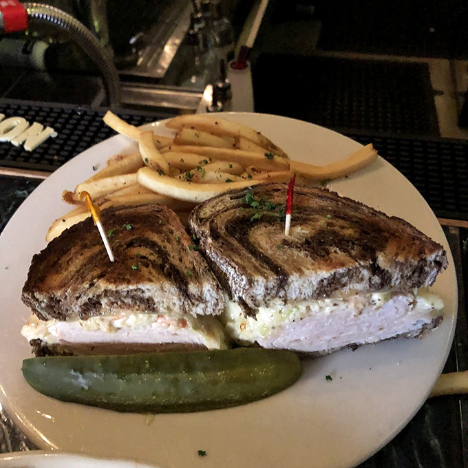 A sandwich so perfectly constructed it deserves its own architectural award. Look at those layers! That structural integrity! That pickle standing guard!