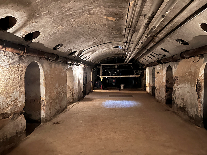 The underground corridor leading to the dungeon cells feels like a portal to another century, with peeling walls telling tales of desperation.