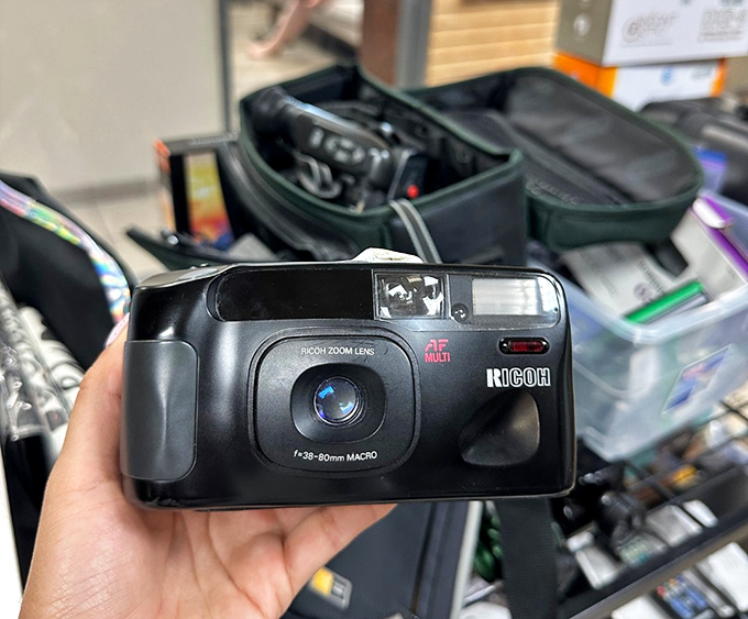 Vintage Ricoh camera—because sometimes the best Instagram filter is no filter at all. Analog treasures in a digital world.