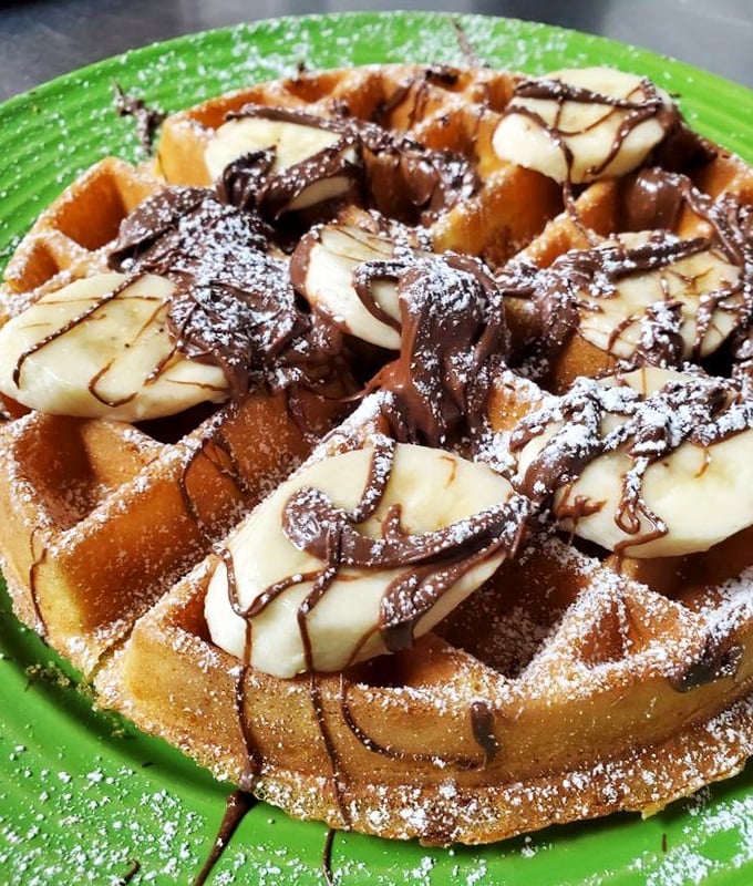 Waffles that don't waffle on flavor&mdash;crisp edges, fluffy centers, and bananas and chocolate that make breakfast feel like dessert.