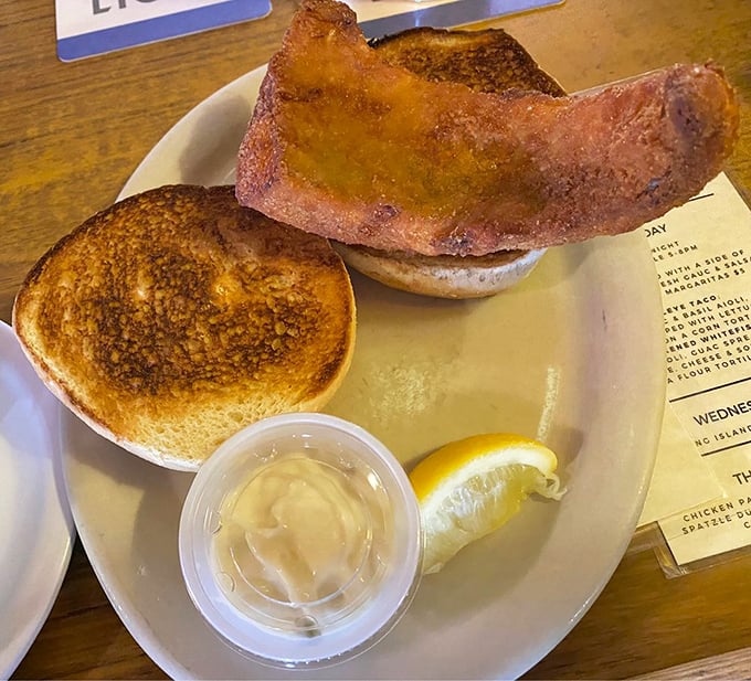 That walleye sandwich isn't messing around. The perfectly toasted bread barely contains the golden-fried Lake Erie goodness within.