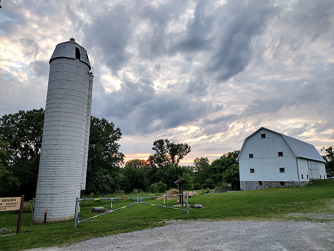This charming white barn stands as testament to Ohio's agricultural heritage and timeless rural beauty.