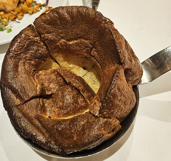 The Yorkshire pudding at Lawry's isn't dessert but a crater-like popover designed to soak up every last drop of that precious beef jus.