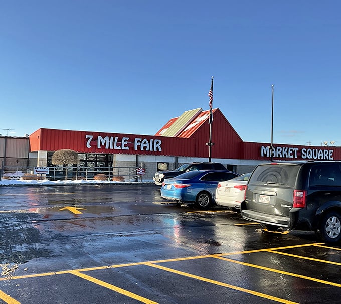 The massive red barn proclaims "7 Mile Fair" like a promise of endless discoveries.