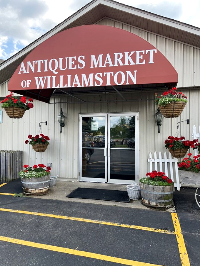 The Antiques Market of Williamston welcomes you with hanging flower baskets &ndash; country charm with a side of bargain hunting.